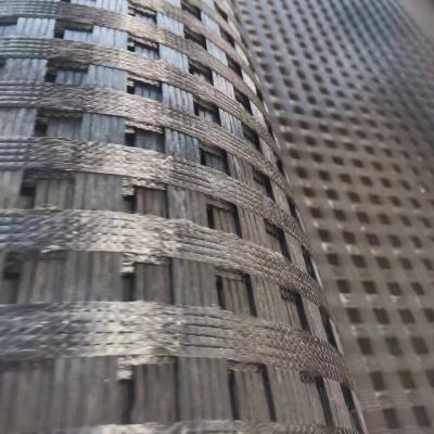 China Road Grid 200-100 KN/M Uniaxial Polyester Geogrids Stabilize Embankments Slope Retaining Wall for sale