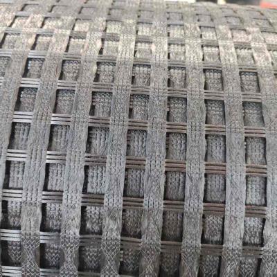 China Acid And Alkali Resistant Warp Knitted Polyester Geogrids For Landfill Side Slopes Reinforcement for sale