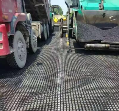 China 200-100 Kn/M Reinforced PET Polyester Geogrid For Foundation And Subgrade Stability for sale