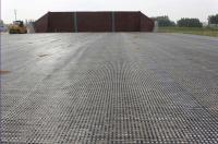 China 100-100 KN /M Fiberglass Geogrid Biaxial Geogrid Ground Grid Fiberglass Geogrid Coated With Bitumen for sale