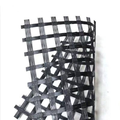 China Self-Adhesive Type Fiberglass Geogrid Glasgrid For Asphalt Overlay Reinforcement Roll Size 3.95x50m for sale