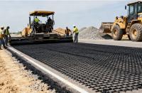 China Width 5.2M Flexibility 60-60 KN/M Two Way Reinforce Polyester Geogrid For  RoadBed Soft Soil Layer for sale