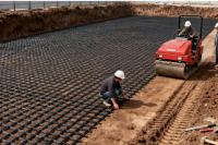 China Flexibility 80-30KN/M Uniaxial Reinforcement Polyester Geogrid  Expressway  Retaining Walls Reinforce for sale