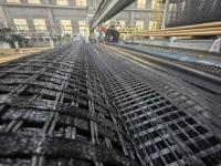 China High Tensile Strength 80-30KN/M  Polyester Geogrid Reinforcement  Foundation Stabilization Ground Improvement for sale