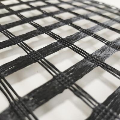 China 80-30KN/M Uniaxial Polyester Geogrid for Primary Reinforcement in Retaining Walls and Embankments for sale