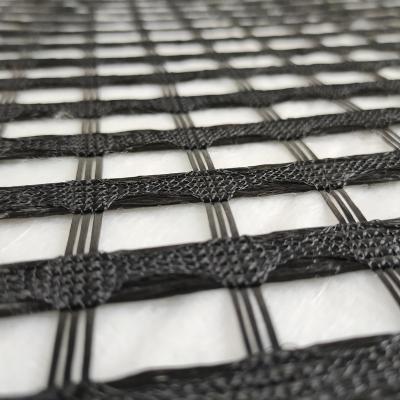 China Ultra High Strength 200-30 KN/M Uniaxial Polyester Geogrid One Direction Reinforce Embankment for sale
