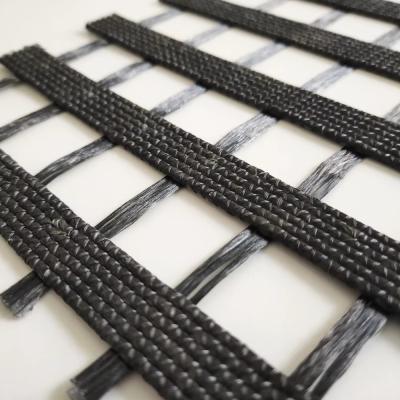 China Low Creep Long Life 200-30 KN/M Uniaxial Polyester Geogrid  Reinforce  Slope Stabilization Soft Ground for sale