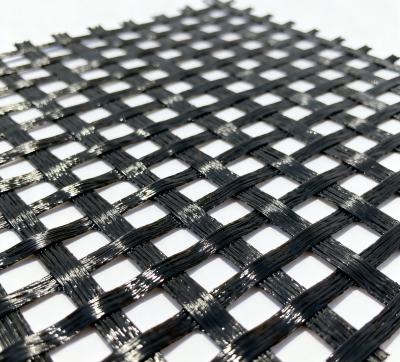 China 50.8x50.8mm Grid Mesh Size 200-30 KN/M Uniaxial Polyester Geogrid Reinforcement of weak ground For Transportation for sale