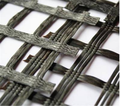 China Excellent Creep Resistance Flexibility Coated SBR Or PVC Uniaxial Woven Polyester Geogrid Reinforced Soil Walls for sale