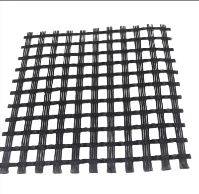 China ASTM D6637 Aperture Size 25.4mm  200-50KN/M Uniaxial Woven Polyester Geogrid Embankment Stabilization Over Soft Soil for sale
