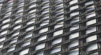China Warp Knitted Grid Mesh Size 50.8mm Polyester Biaxial Geogrid Base Reinforcement Of Unpaved And Paved Roads for sale