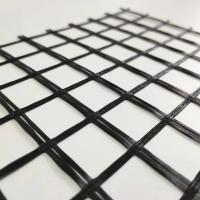 China Prevent Cracking Asphalt Driveway  Coated Bitumen  Fiberglass Geogrid 50 50 Grid Mesh 25.4mm for sale