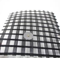 China Coated Bitumen Elongation ≤3%  Reinforcement Fiberglass Geogrid 120 120 Prevent Cracking Asphalt Driveway for sale