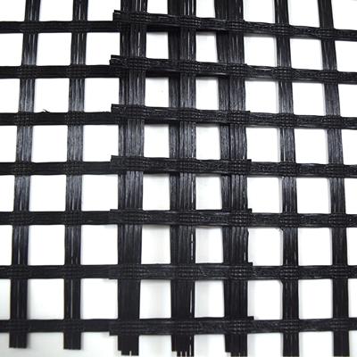 China Ultimate Tensile Strength  100KN/M  Woven Coated Bitumen  Fiberglass Geogrid Reflective Cracking Asphalt Driveway for sale