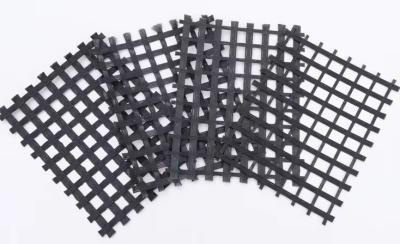China Low Creep Woven Coated Bitumen Reinforcement Fiberglass Geogrid BX Grid Asphalt Overlay  Pavement for sale