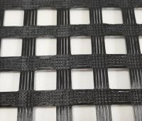 China Aperture Size 12.8mm Warp Knitted Fiberglass Biaxial Geogrid Tensile Strength 50/100 KN Base Reinforce Parking Lots for sale