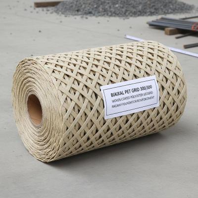China Biaxial PET Grid 300-300 Woven Coated Polyester Geogrid For Railway Foundation  Reinforcement for sale