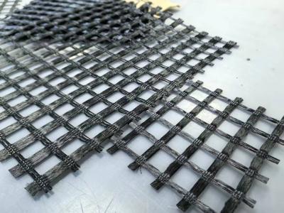 China Elongation less than or equal to 13 percent Polyester Geogrid Mesh Size 50.8 by 50.8 or 25.4 by 25.4 Ideal for Ground Stabilization Projects for sale