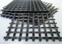 China Uniaxial 150-50 KN/M Woven Polyester Geogrid Railroad Subway And Highway Soil Reinforcement for sale