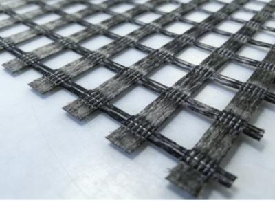 China Road Maintenance And Repair Black Woven Polyester Geogrid Material For Soil Reinforcement And Pavement Structural Integrity for sale