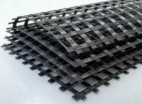 China Low Creep Uniaxial 200-50 KN/M PVC Coated Polyester Geogrid Retaining Wall  Steep Slop Road Base for sale