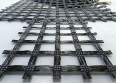 China Low Creep Uniaxial 200-50 KN/M PVC Coated Polyester Geogrid Retaining Wall  Steep Slop Road Base for sale