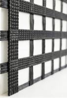 China Reinforcement Embankment 200-100 KN/M PVC Coated Uniaxial Polyester Geogrid For Expressway Highway for sale