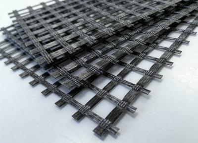 China Long Term Design Strength 200-100 KN/M PVC Coated Uniaxial Polyester Geogrid Reinforcement Embankment for sale