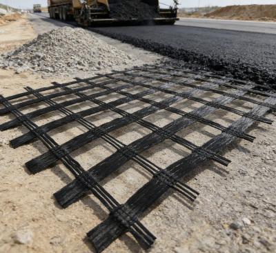 China 12.7x12.7mm Open Grid Fiberglass Geogrid High Tensile Low Elongation Mesh Used in Road Construction and Earth Retaining Systems for sale