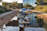 China Stainless Steel Infinite Ball Sphere Art Outdoor Metal Sculpture 100cm Mirror Polished for sale