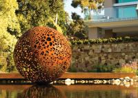 China Delicate Corten Steel Carved Hollow Ball Sculpture 1 Meter Garden Decoration with Custom Sizes Available for sale