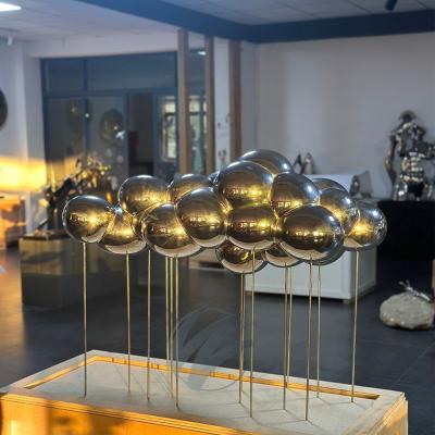 China Stainless Steel Modern Mirror-finished Abstract Cloud Shaped Sculpture for sale
