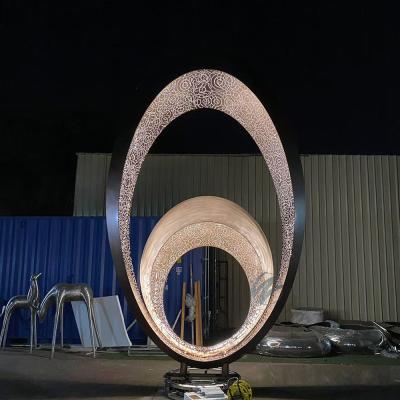 China Modern Garden Decoration Bronze Egg Sculpture With Light for sale