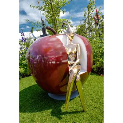 China Bronze Lady on Red Apple Chair Sculpture 160cm H Outdoor Art for sale