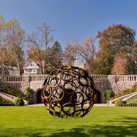 China Custom Corten Steel Hollow Ball Garden Decoration 150cm Height Outdoor Sculpture for sale