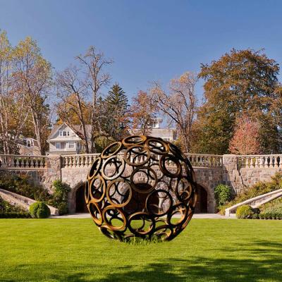 China Custom Corten Steel Hollow Ball Garden Decoration 150cm Height Outdoor Sculpture for sale