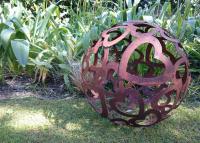 China Large Heart Pattern Corten Steel Hollow Sphere Metal Garden Ball 100 cm for sale