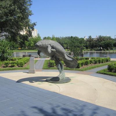 China Large Bronze Manatee Sculpture Custom Size Coastal Garden Decor Marine Animal Outdoor Art Statue for sale