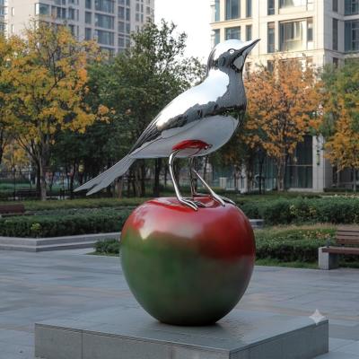 China Outdoor Mirror Polished Stainless Steel Bird on Apple Sculpture for sale