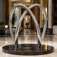 China Mirror Polished Stainless Steel Double Arch Tube Sculpture, Modern Abstract Art Decor for sale