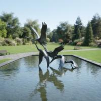 China Outdoor Bronze Crane Sculpture Flying Birds Garden Statue Water Feature Pond Decor Large Metal Patina Finish Landscape Custom for sale
