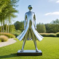 China Custom Mirror Polished Stainless Steel Contemporary Figure in a Flowing Coat for sale