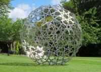 China Stainless Steel Hollow Sphere Sculpture 120cm Mirror Polished Garden Ornament for sale