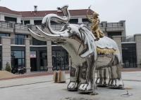China Life Size Brass Man Sitting on Polished Stainless Steel Elephant Sculpture Outdoor Art for sale