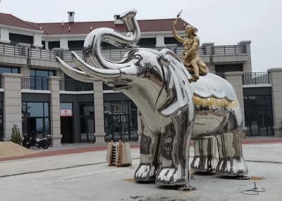 China Life Size Brass Man Sitting on Polished Stainless Steel Elephant Sculpture Outdoor Art for sale