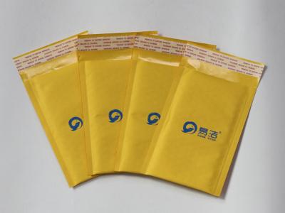 China customize yellow printing Kraft Bubble Mailer , Cushioned Postage Mailing Bags 165*200+40mm and 150*180+40mm for sale