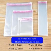 China Width 70cm 100pcs/Pack Extra Large Custom Printing Garment Packing Self Sealing Bopp Door-mat Bag Clear Plastic Cellophane Bag for sale