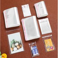 China Width 20cm Wholesale Customized Self Seal Adhesive Bopp Pp Opp Poly Plastic Cello Packaging Bags for Candy Garment Clothing for sale