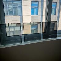 China 125W 179V CdTe BIPV Solar Glass Curtain Wall 40% Transparent Building Integrated Photovoltaic Facade for sale