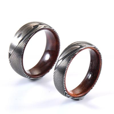 China 6mm 8mm Etched Damascus Steel Wedding Rings with Rose Wood Sleeve Inlay for Christmas Gift for sale